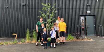 HTA | Elena Whitham MSP plants a tree for her community as part of an ...